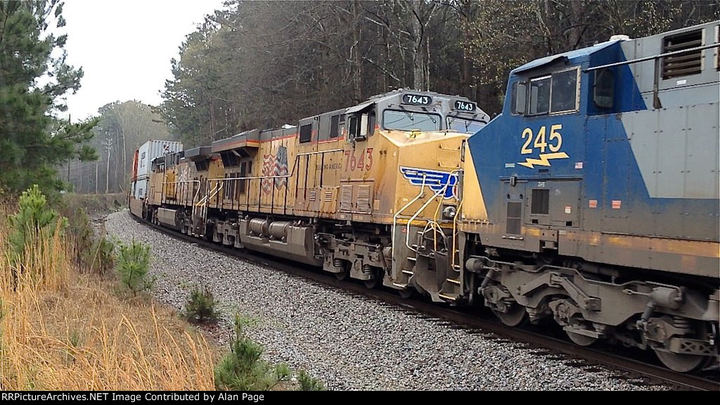 CSX 245 and UP 7643 and 6031 slowly approach a red signal